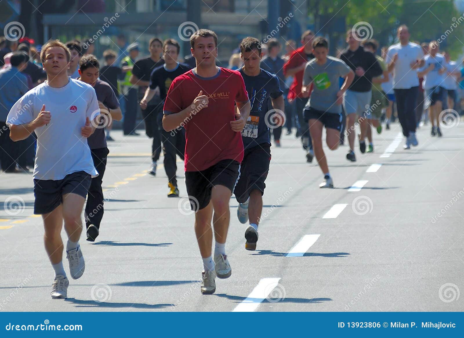 Fun Run runner in action editorial photo. Image of athletics - 13923806