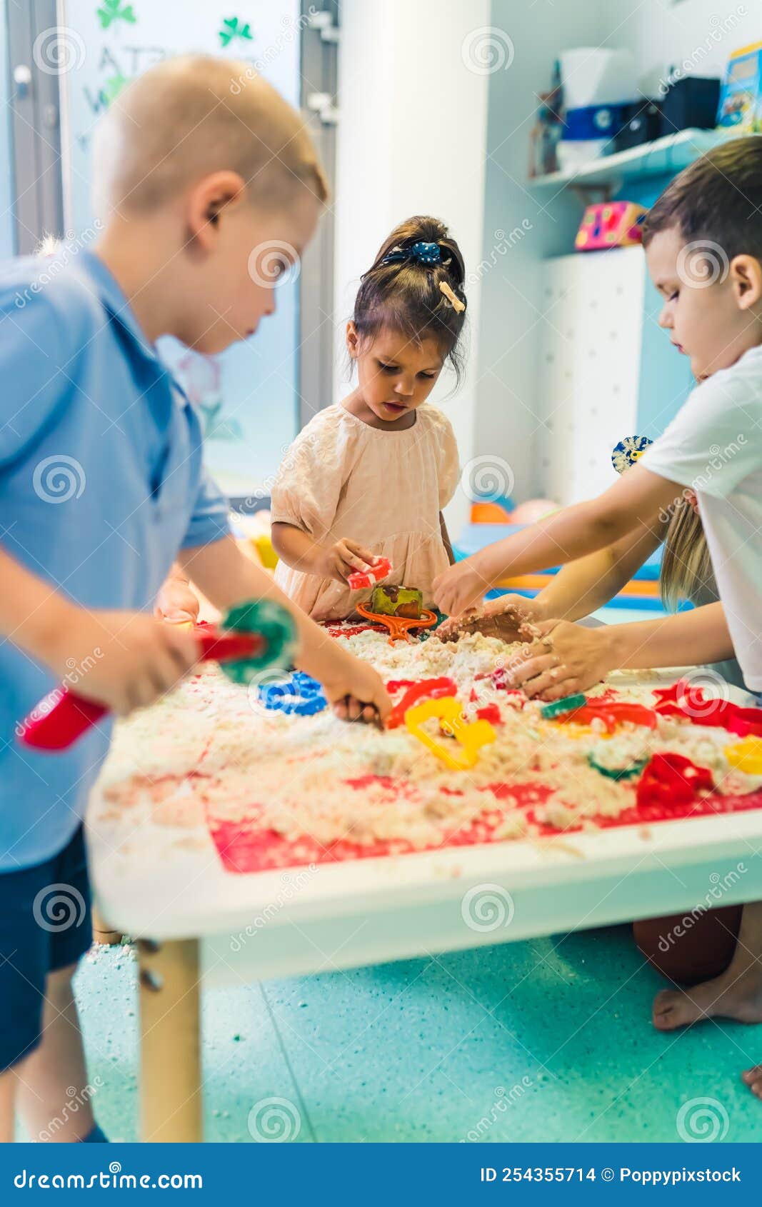 Fun Sensory Play with Moldable Kinetic Sand at Nursery School. Toddlers ...