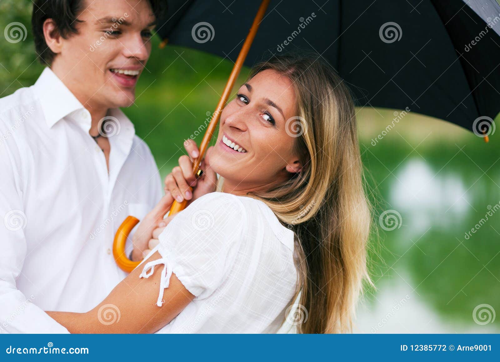 Fun in the summer rain stock photo. Image of enjoyment - 12385772