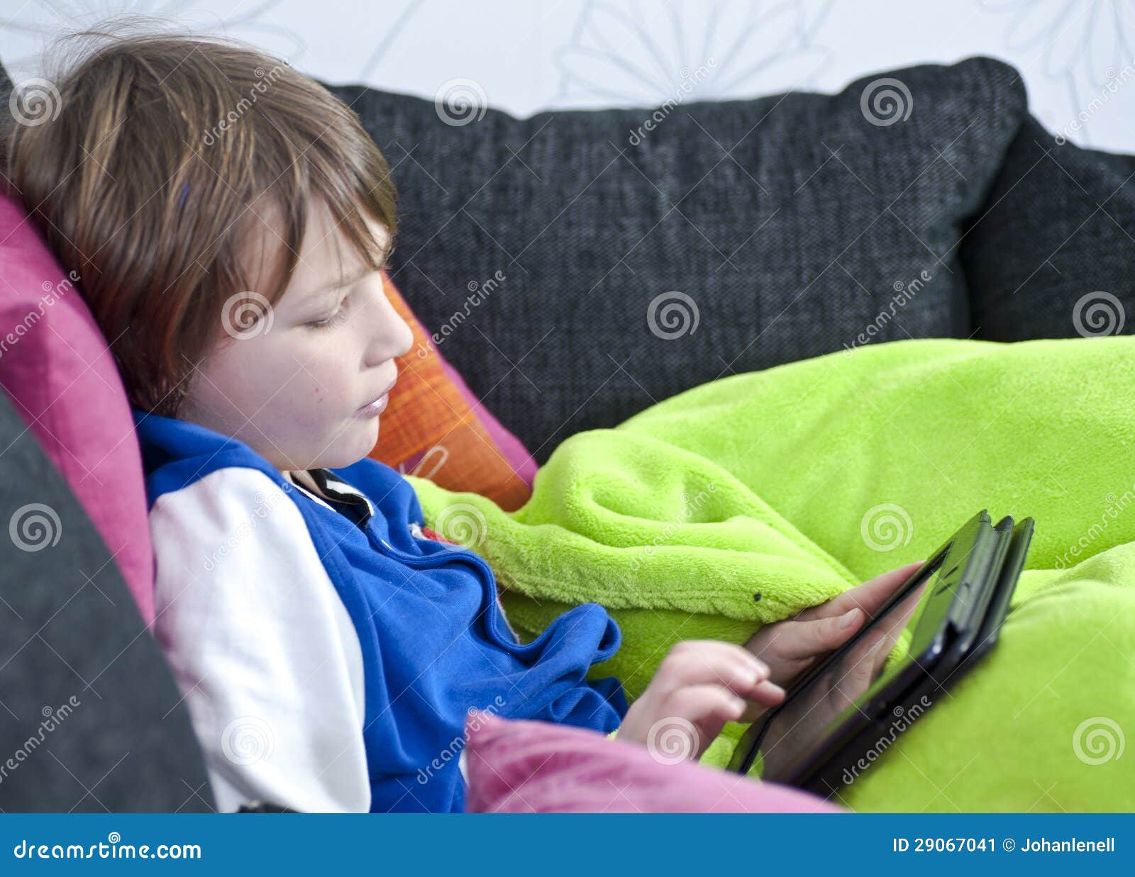Fun with tablet stock image. Image of relax, blanket - 29067041