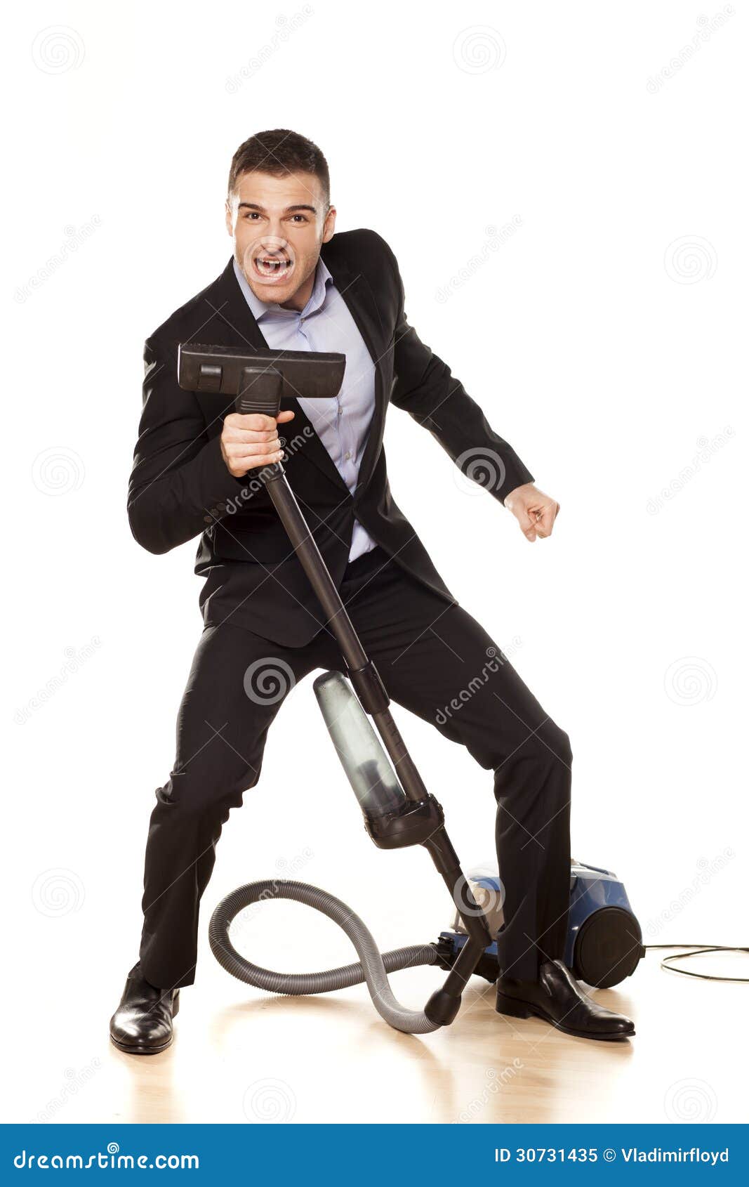Fun with a vacuum cleaner stock image. Image of floor - 30731435
