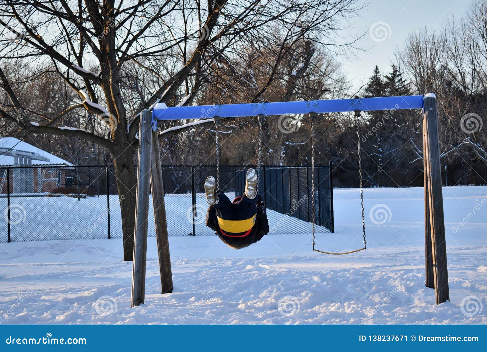 Fun in a winter playground stock image. Image of cold - 138237671