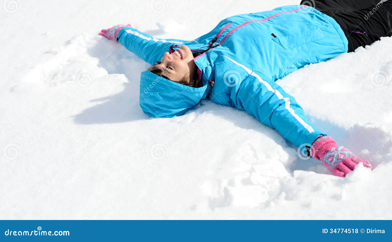 Fun Woman Liying Down in Snow Stock Photo - Image of winter, smiling ...