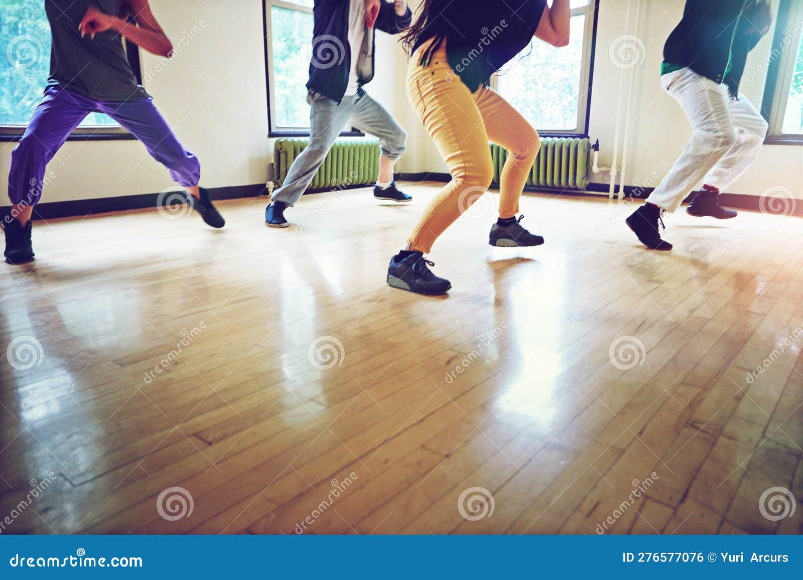 For a Fun Workout, Dance it Out. a Group of People Dancing Together in ...