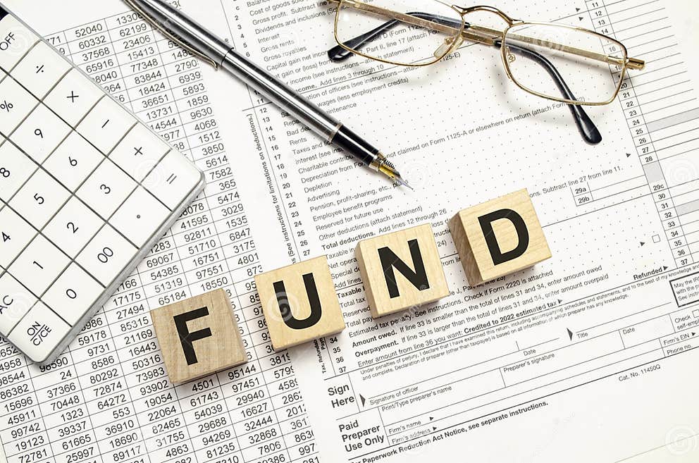 FUND Word Written in Wooden Cubes on Documents Stock Photo - Image of ...