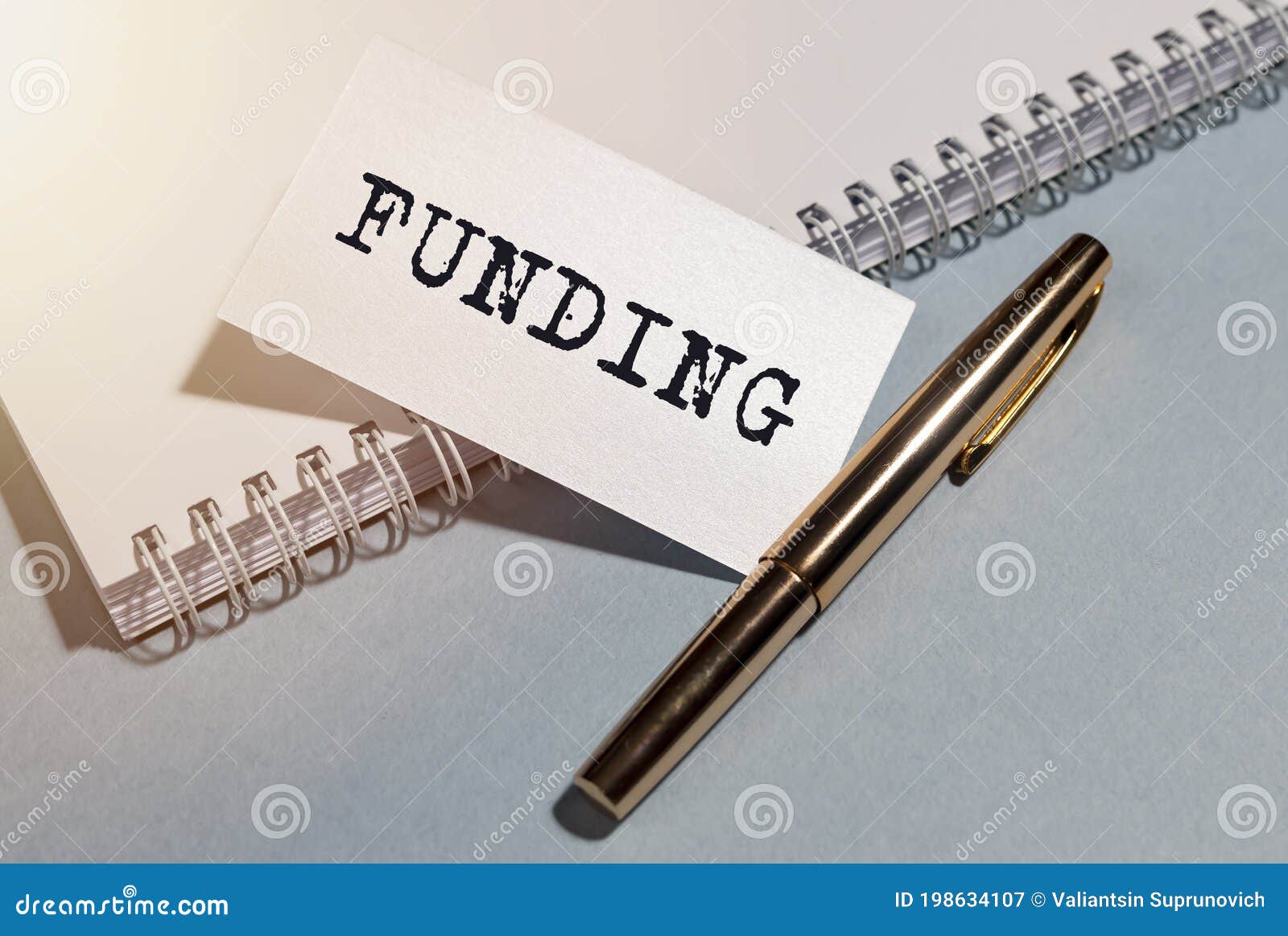 FUNDING Word Written on Paper with Notebook with Pen Stock Image ...