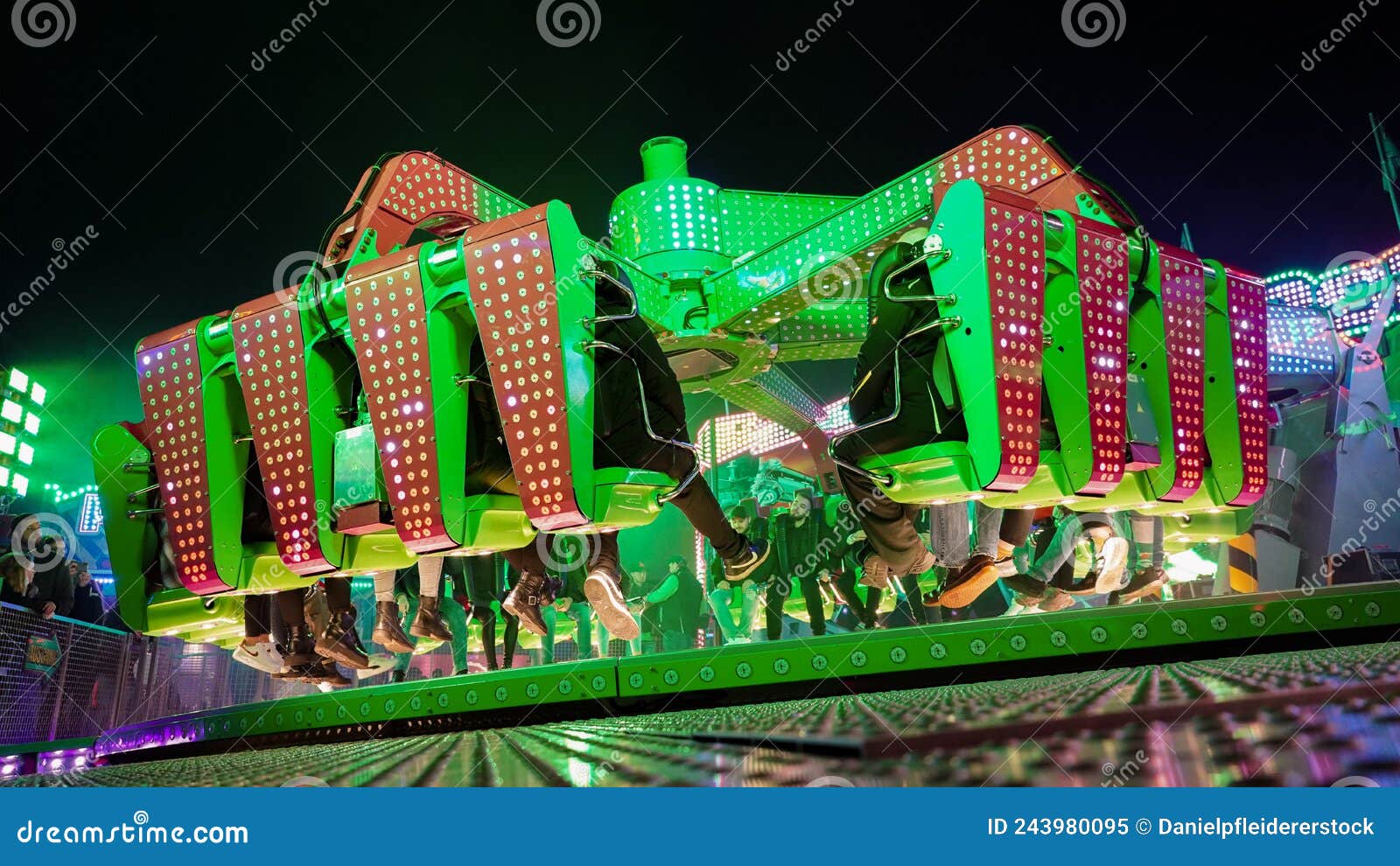 Funfair at night with ride editorial image. Image of neon - 243980095
