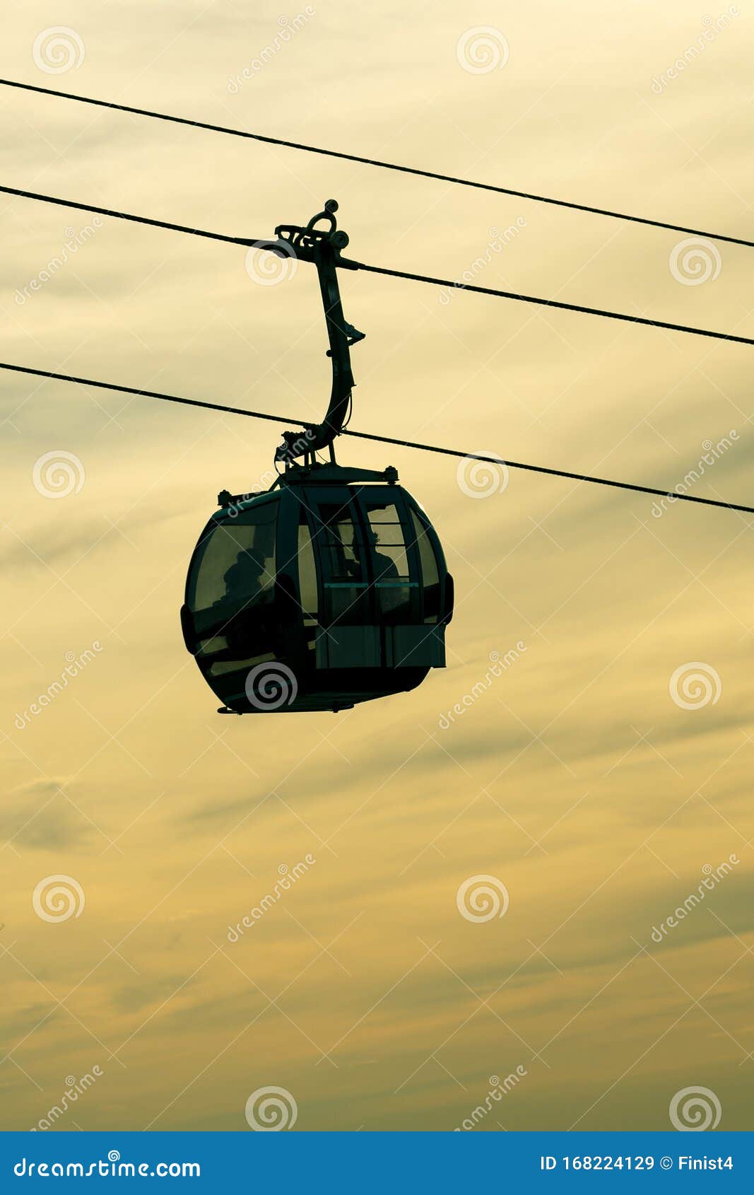 Funicular with Passengers at a Height Against a Cloudy Sky Stock Image ...