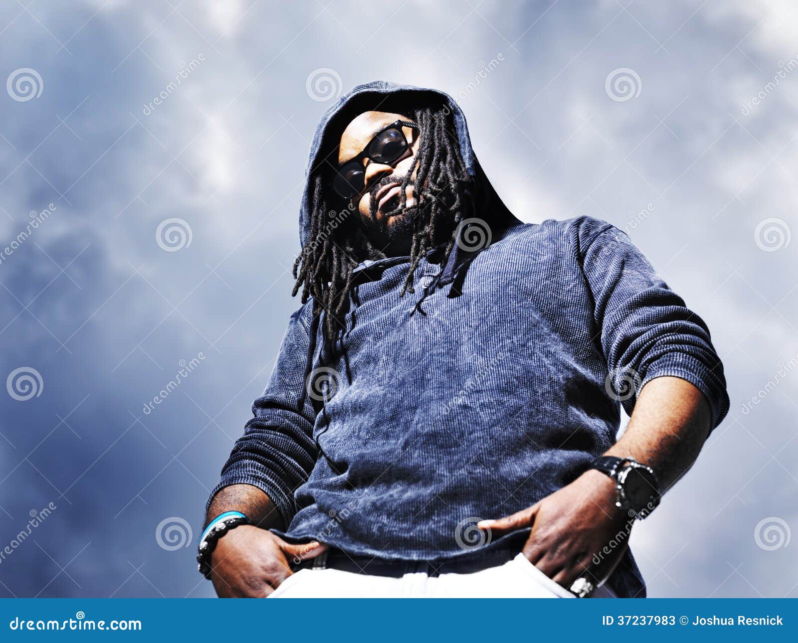 Funky Guy Looking Down on Stormy Sky. Stock Image - Image of person ...