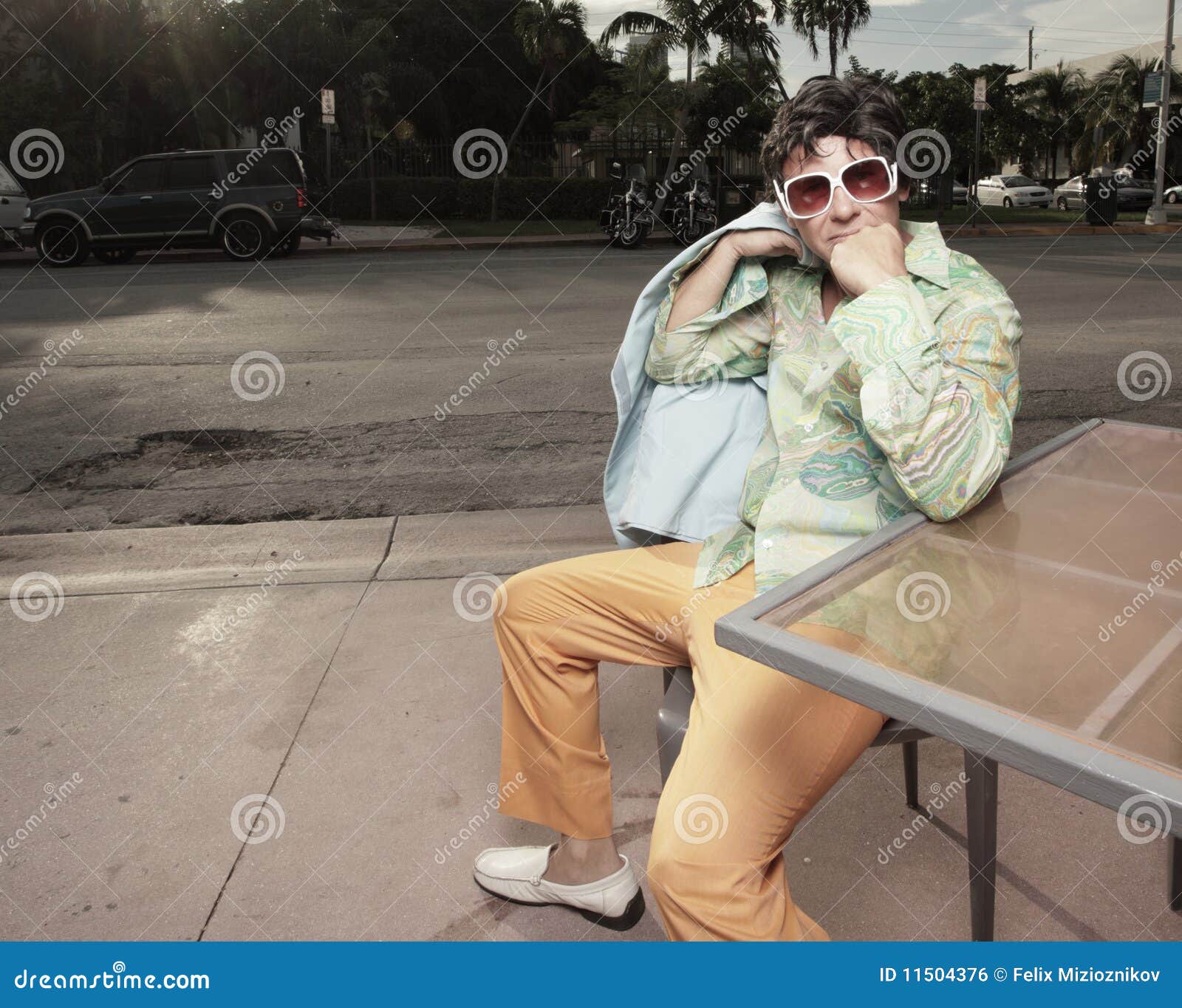 Funky Man Sitting at a Table Stock Photo - Image of male, perspective ...