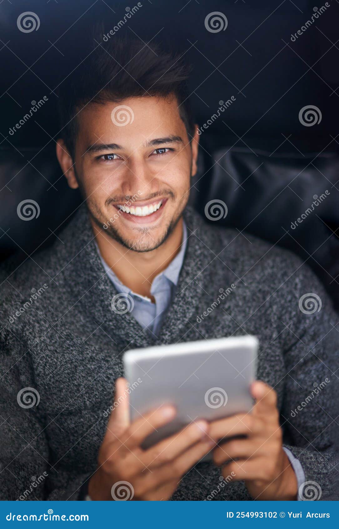 Funniest Meme Ever. Portrait of a Smiling Young Man Using a Digital ...