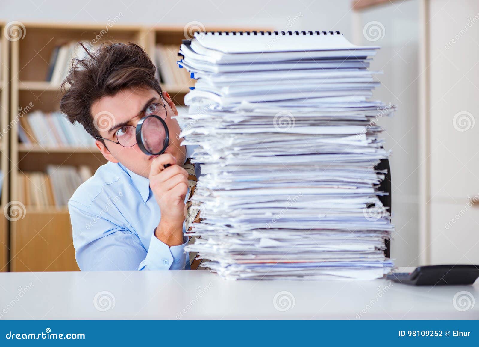 The Funny Auditor Checking Reports with Magnifying Glass Stock Photo ...