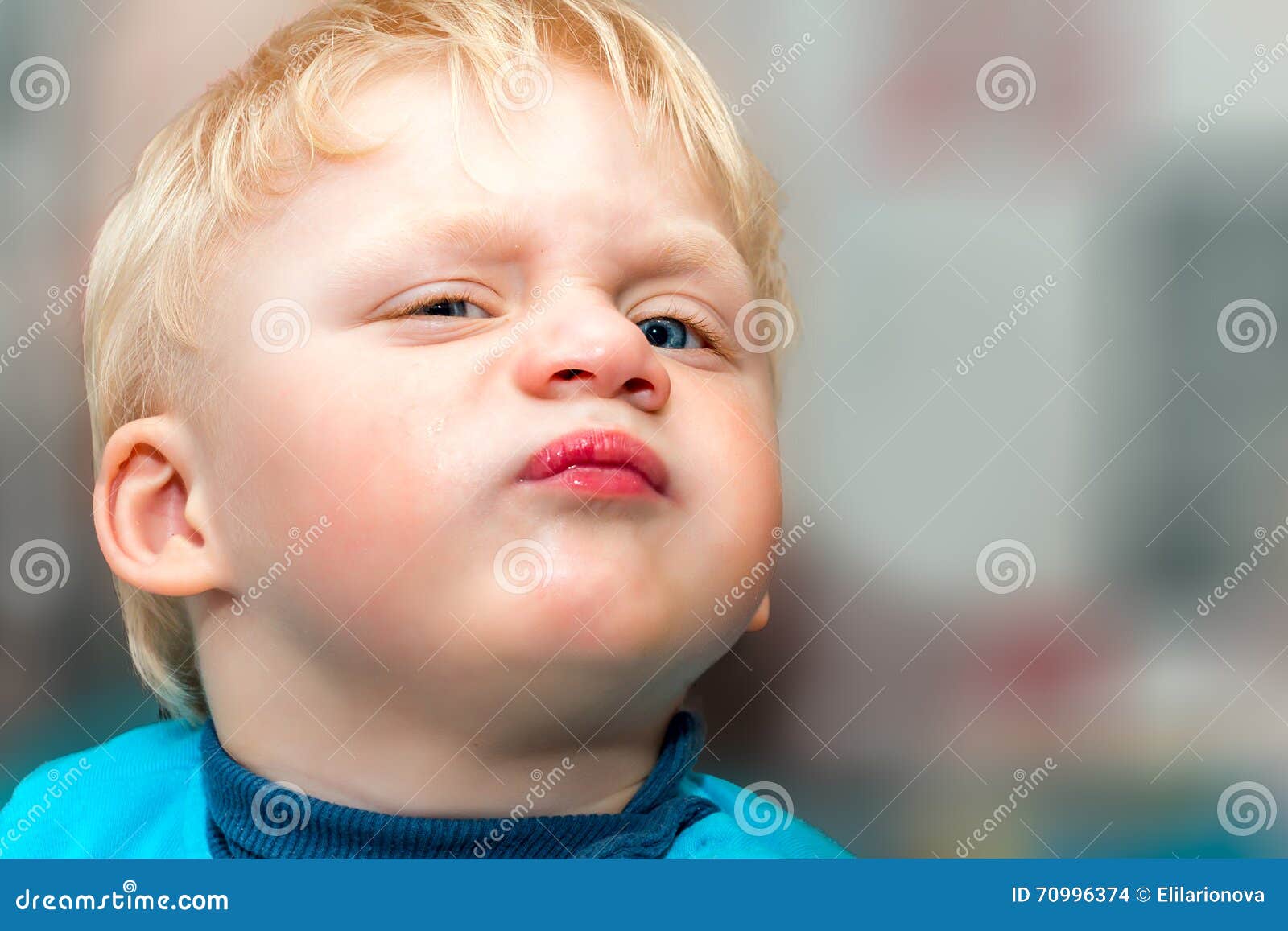 Funny baby grimaces. stock photo. Image of baby, expression - 70996374