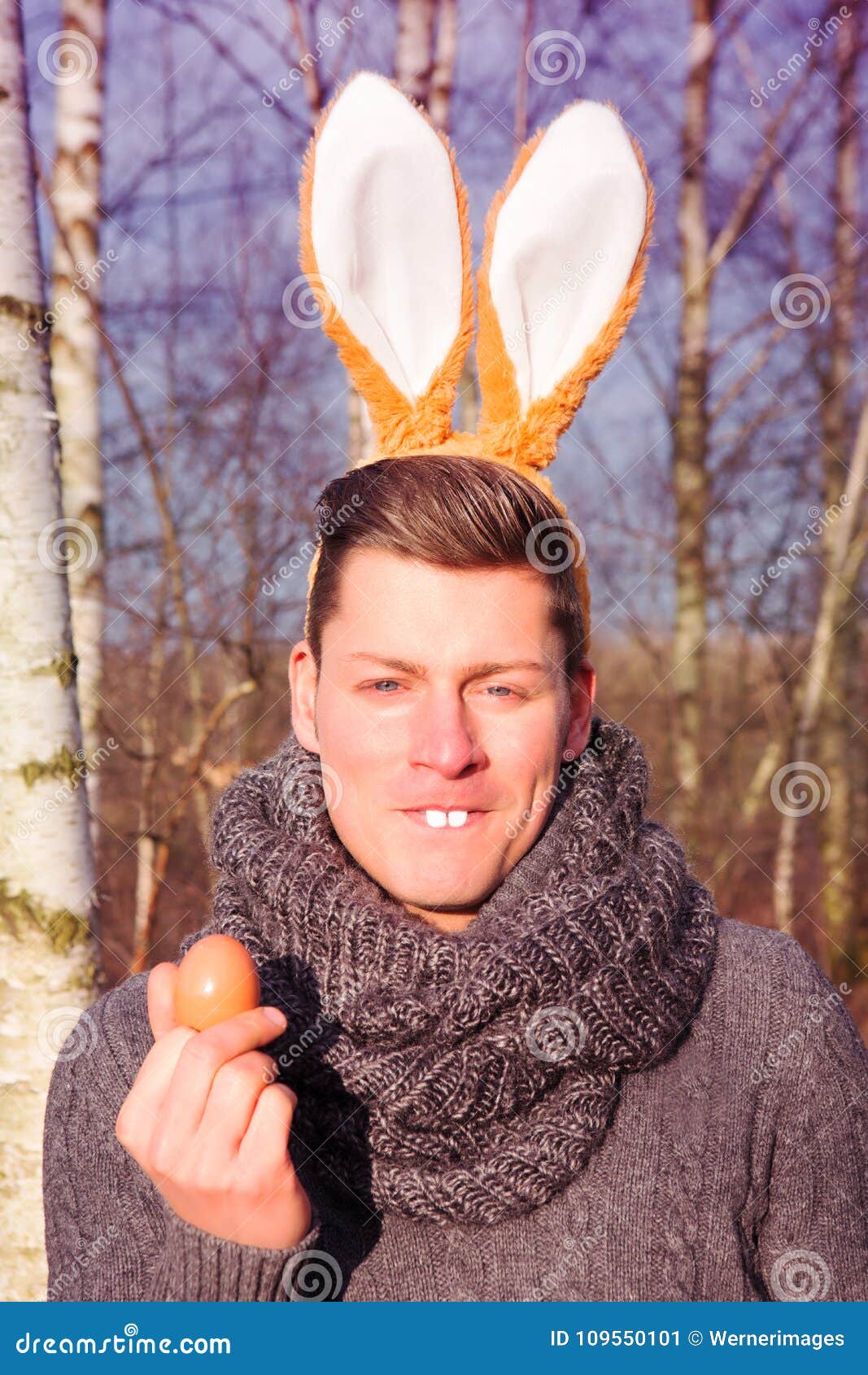Funny Blond Man in the Park with Bunny Ears Stock Image - Image of ...
