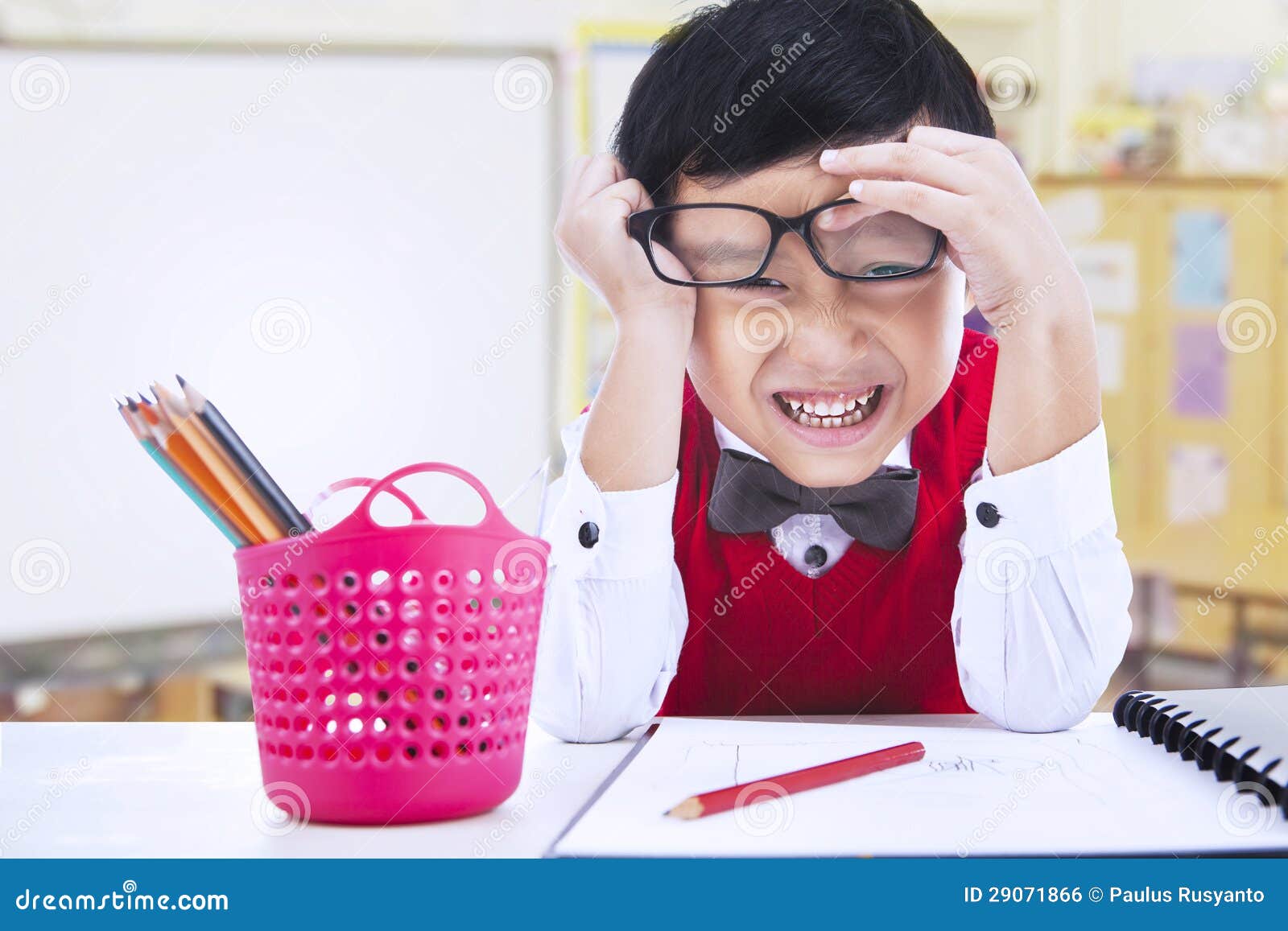 Funny boy in classroom stock photo. Image of education - 29071866