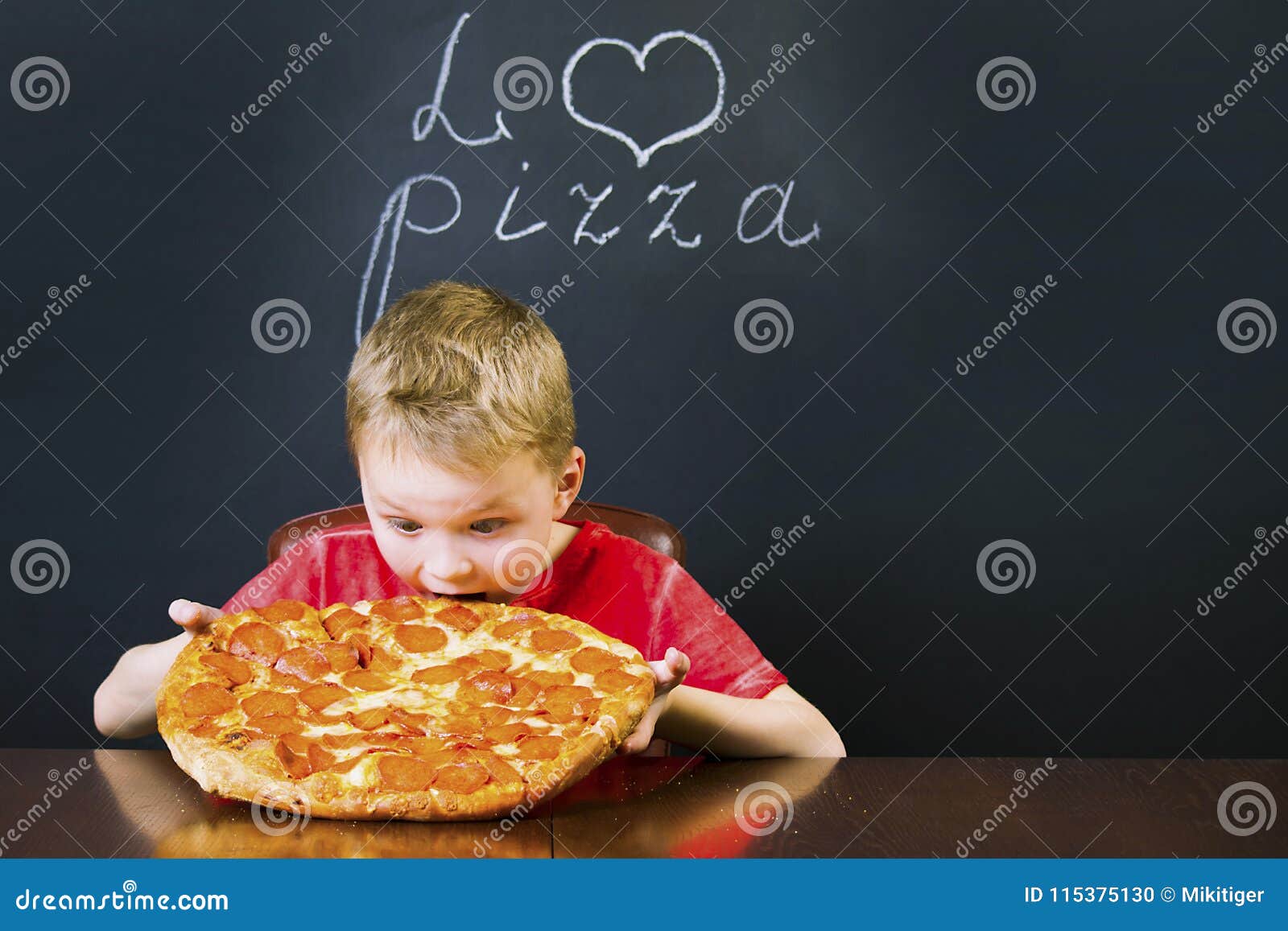 Funny Boy Eating a Big Pizza Stock Photo - Image of cheese, eats: 115375130