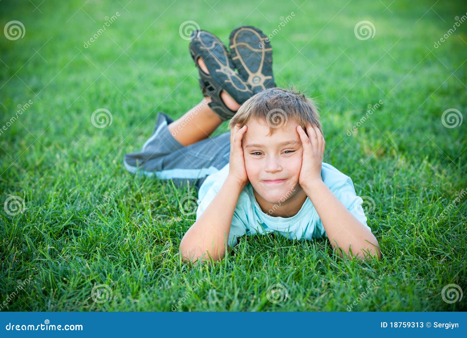 Funny Boy Lying on the Green Grass Stock Image - Image of head, green ...