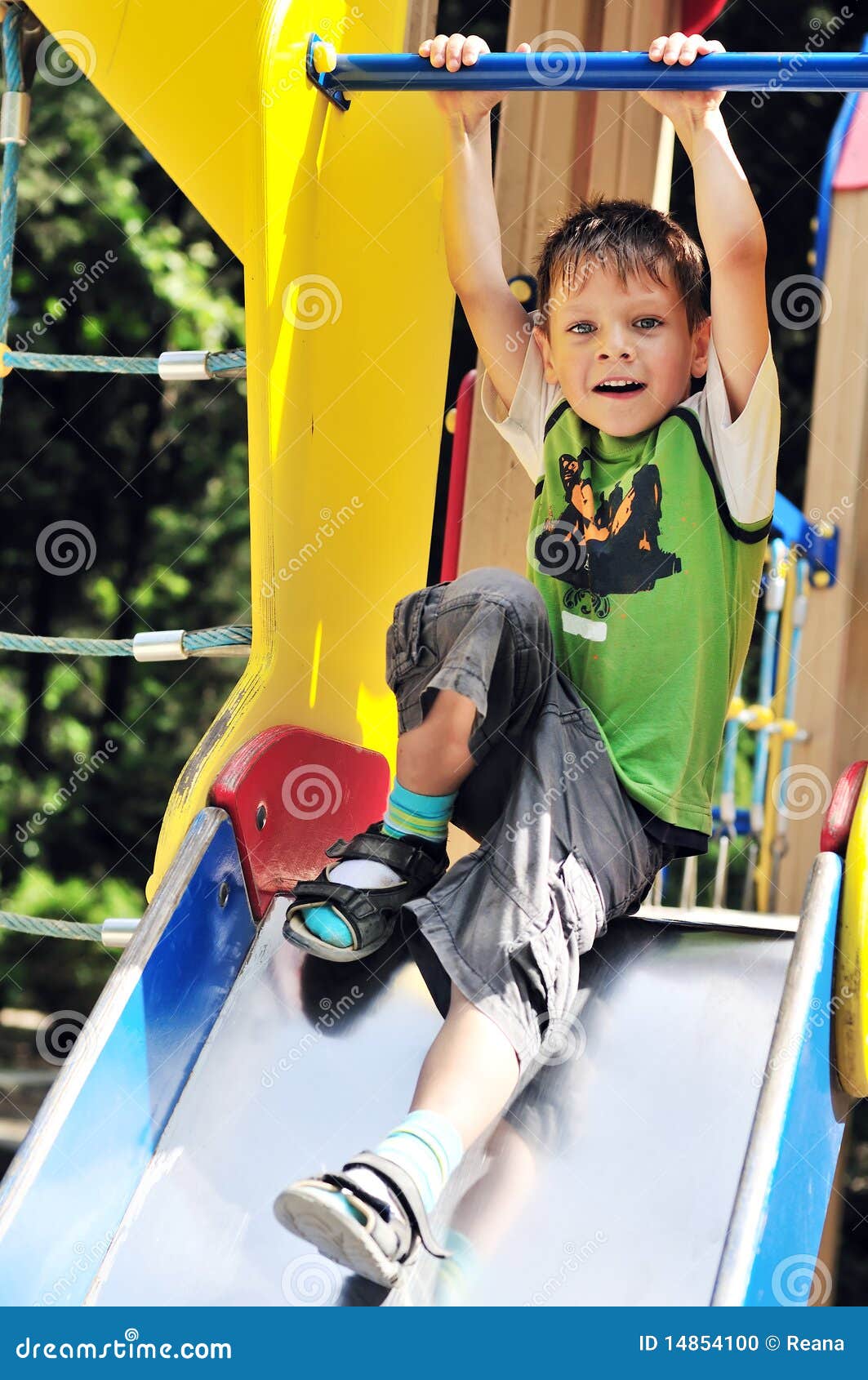 Funny boy on the slide stock photo. Image of hair, motion - 14854100