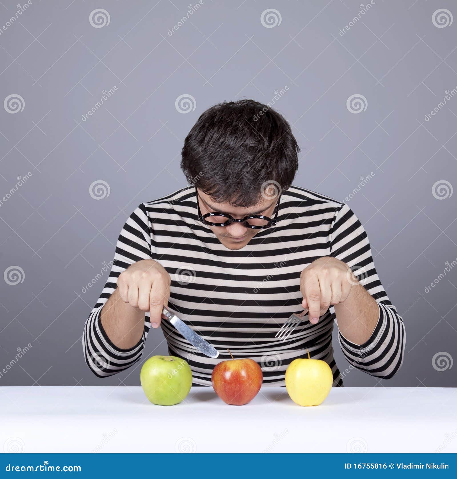 Funny Boy Try To Eat Apples. Stock Photo - Image of three, striped ...