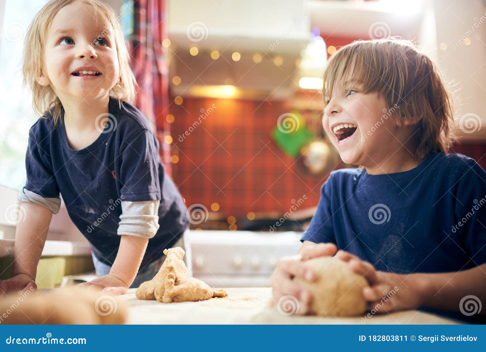 Funny Boys are Preparing the Dough, Bake Cookies in the Kitchen at Home ...