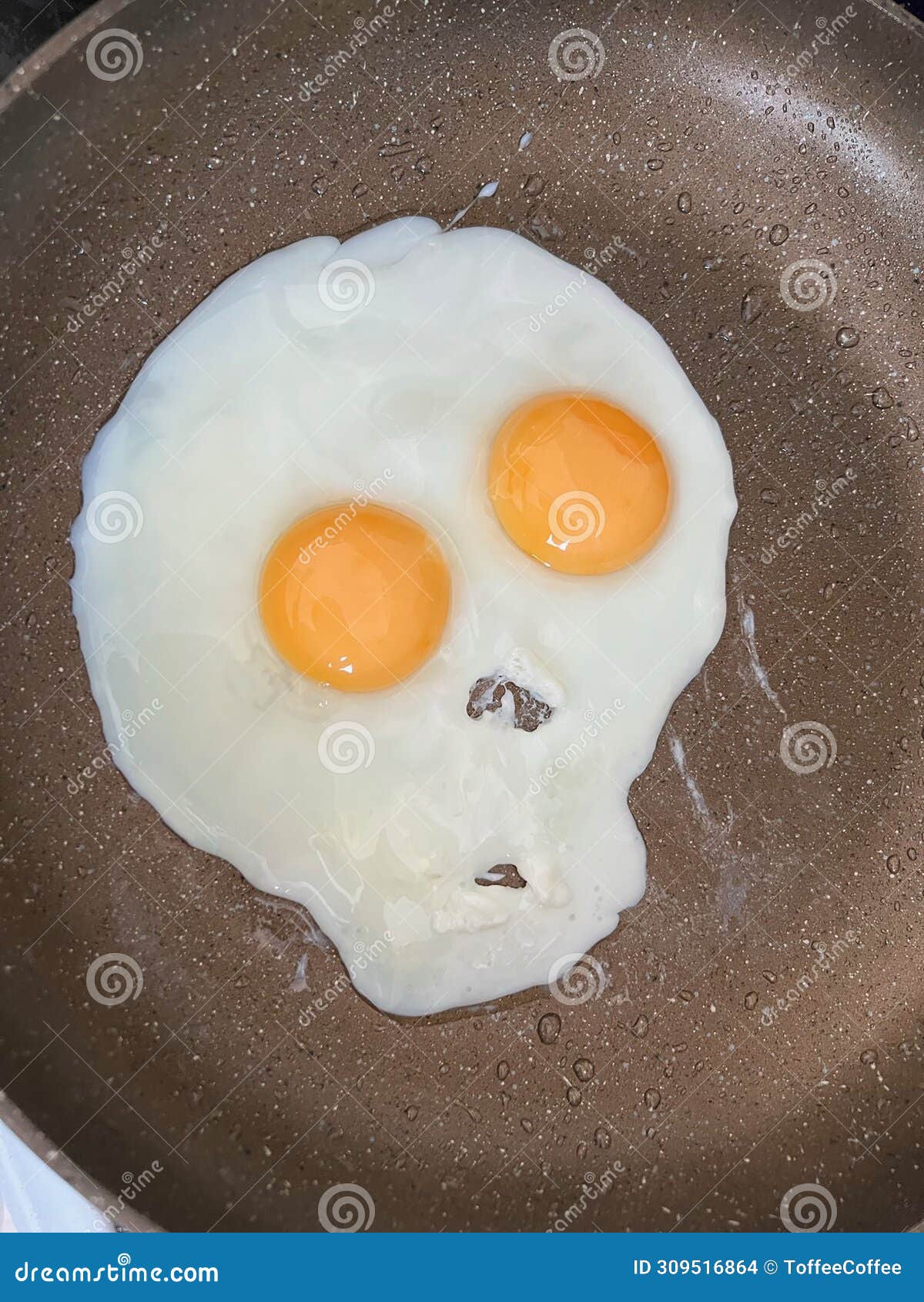 Funny breakfast skull eggs stock photo. Image of dish - 309516864