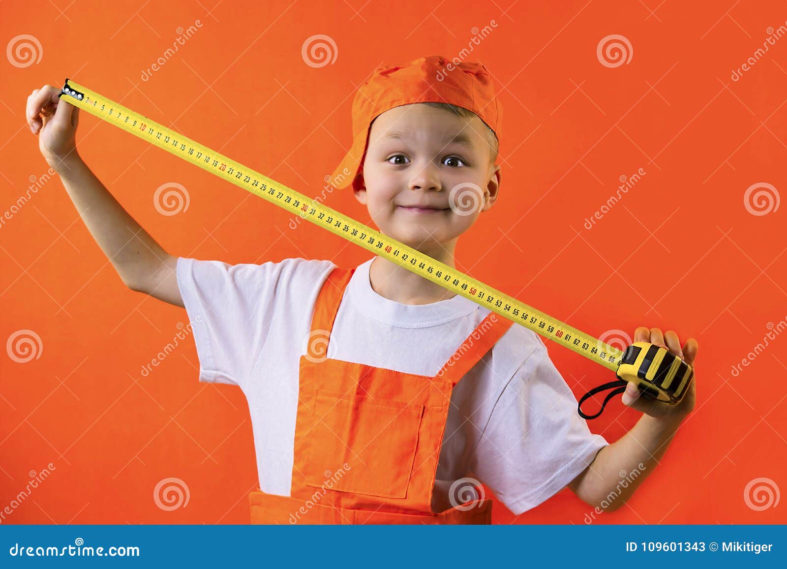 Funny Builder Boy In Uniform Holds A Screwdriver Stock Image ...