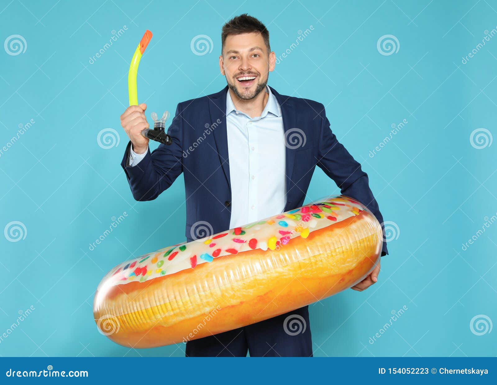 Funny Businessman with Bright Inflatable Ring on Blue Stock Image ...