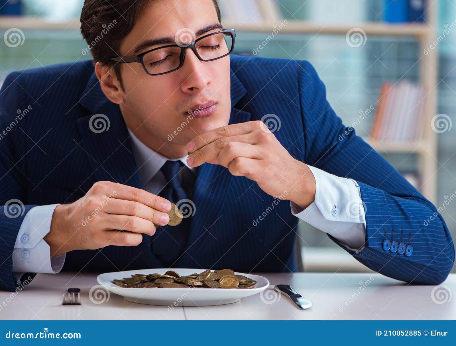 Funny Businessman Eating Gold Coins in Office Stock Image - Image of ...