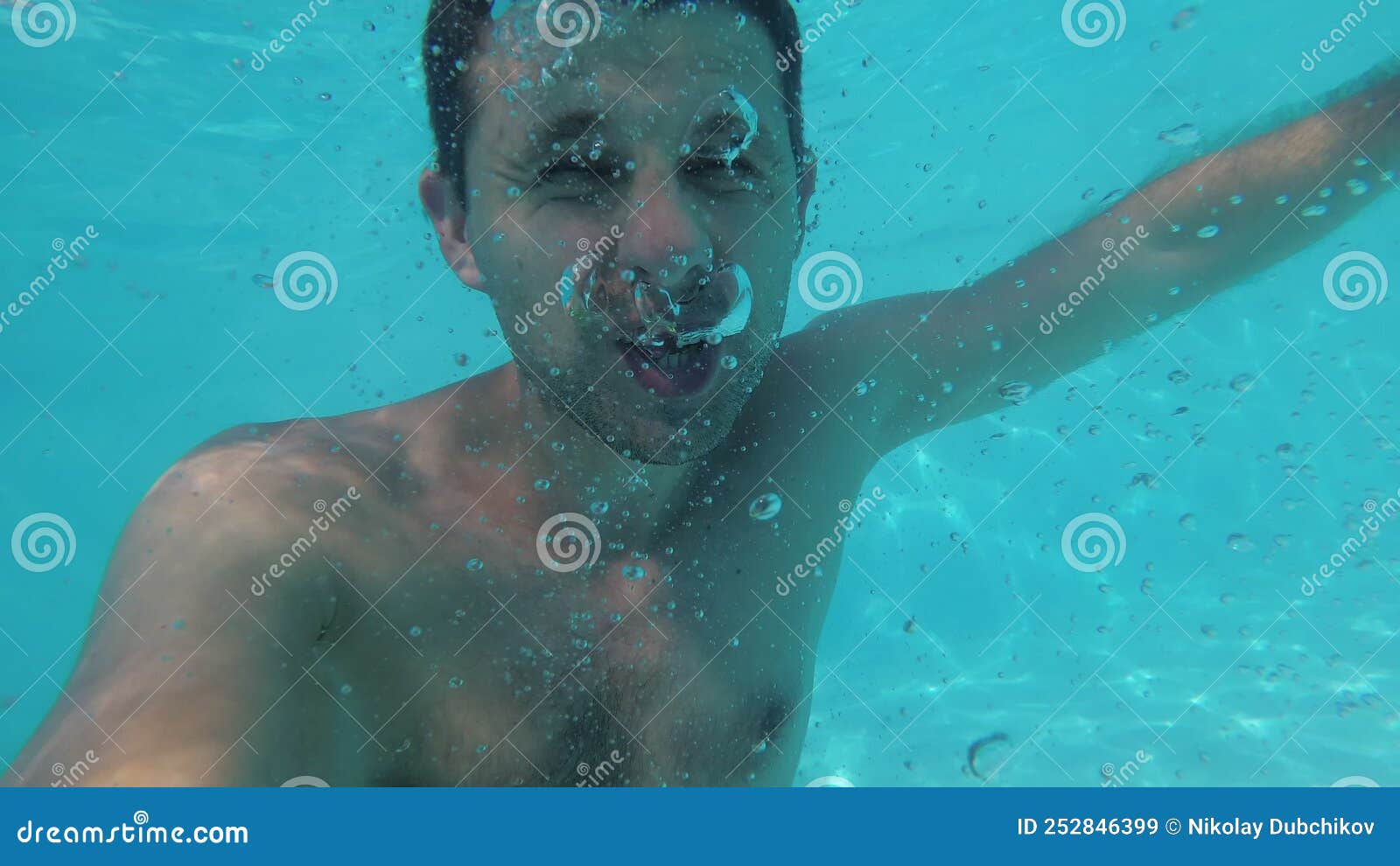 Funny Cheerful Crazy Man Screaming Underwater in the Pool Stock Video ...