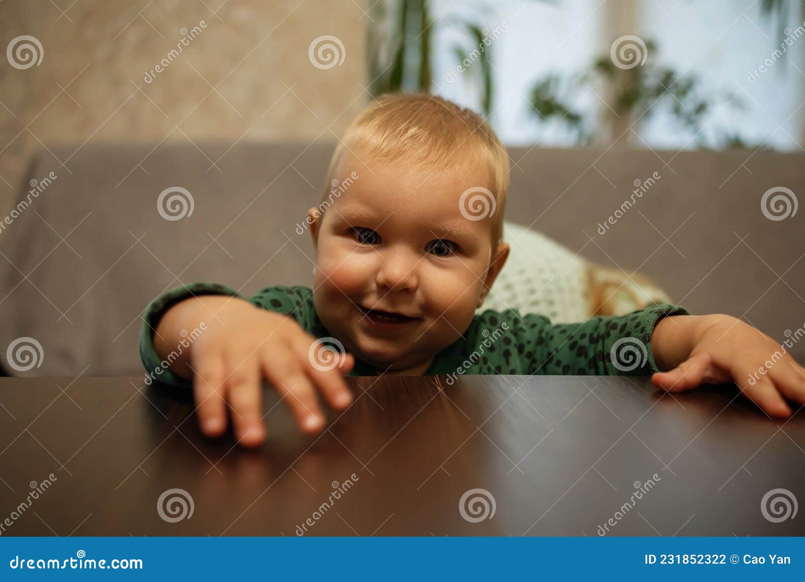 The Funny Child Sits at an Empty Table Stock Photo - Image of finger ...