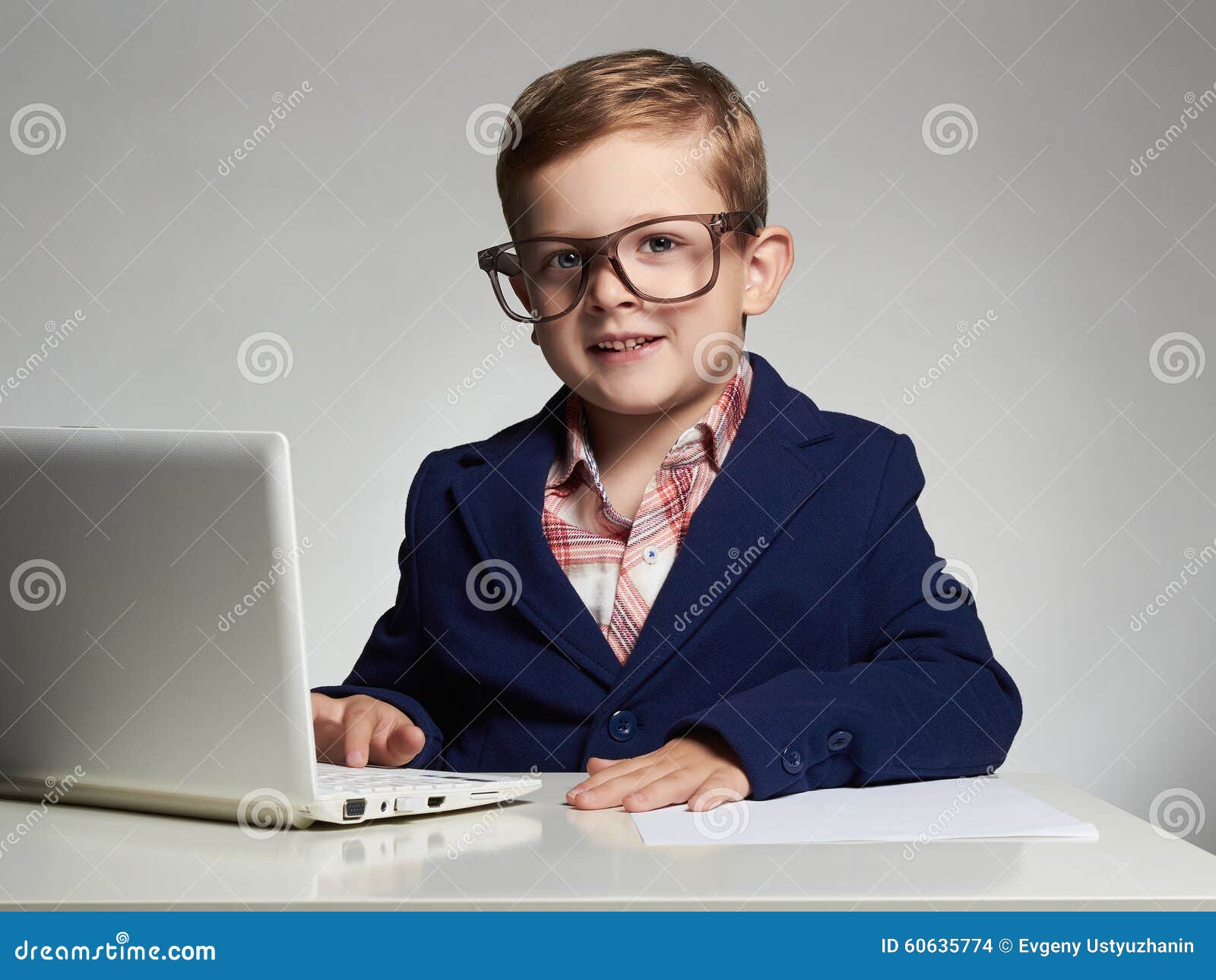 Funny Child With Computer.Young Business Boy Stock Photo - Image: 60635774