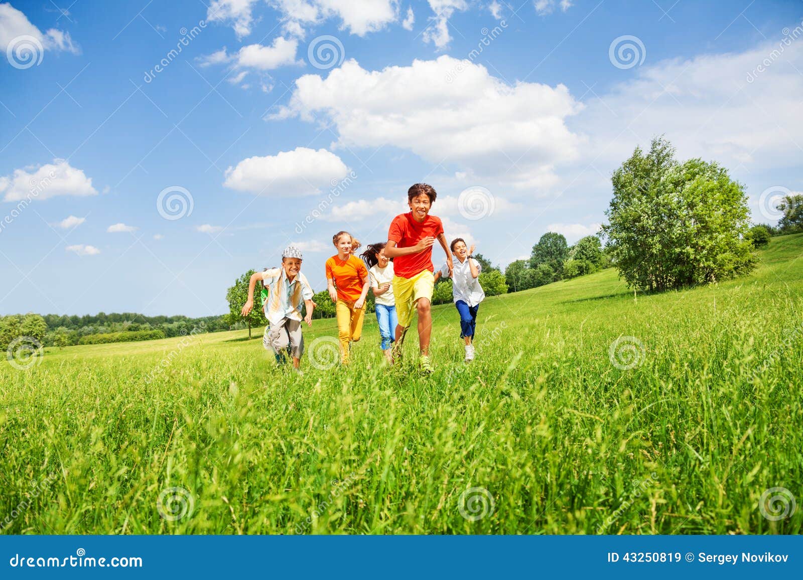 Funny Children Running Together in the Field Stock Image - Image of ...