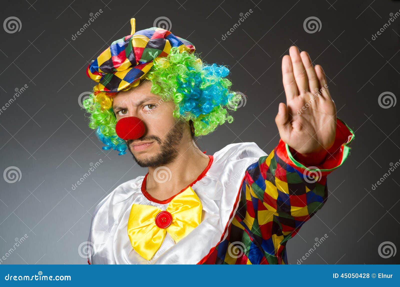 Funny clown in colourful stock photo. Image of buffoon - 45050428