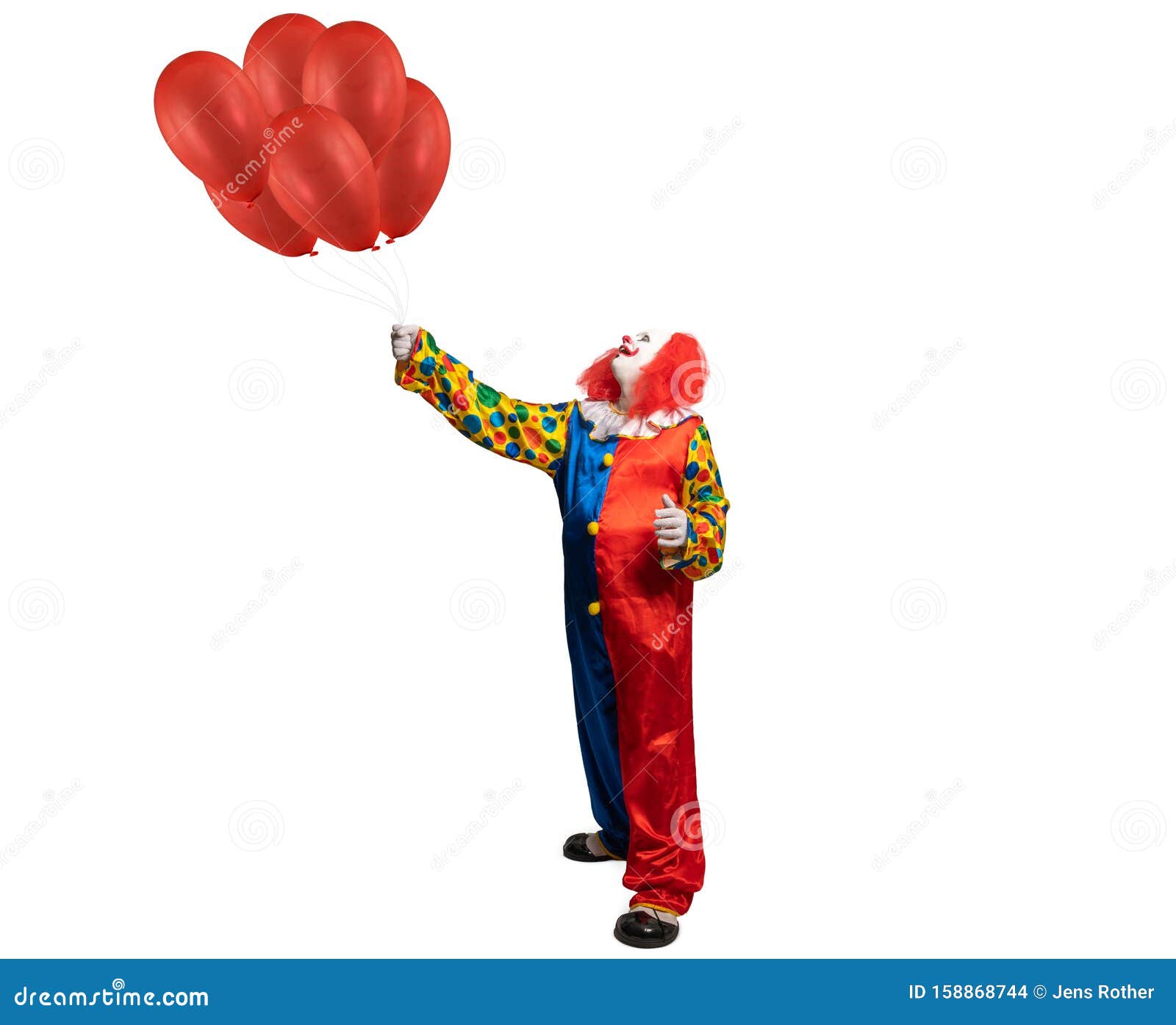 A Funny Clown Holds Ballons in His Hand Stock Photo - Image of ...