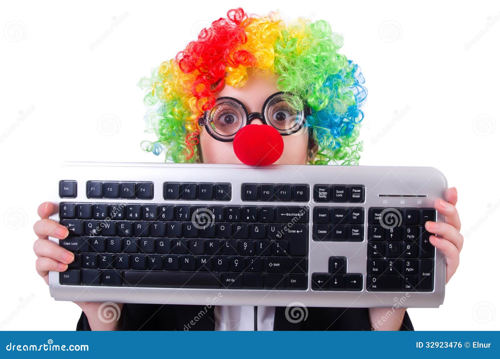 Funny clown with keyboard stock photo. Image of female - 32923476