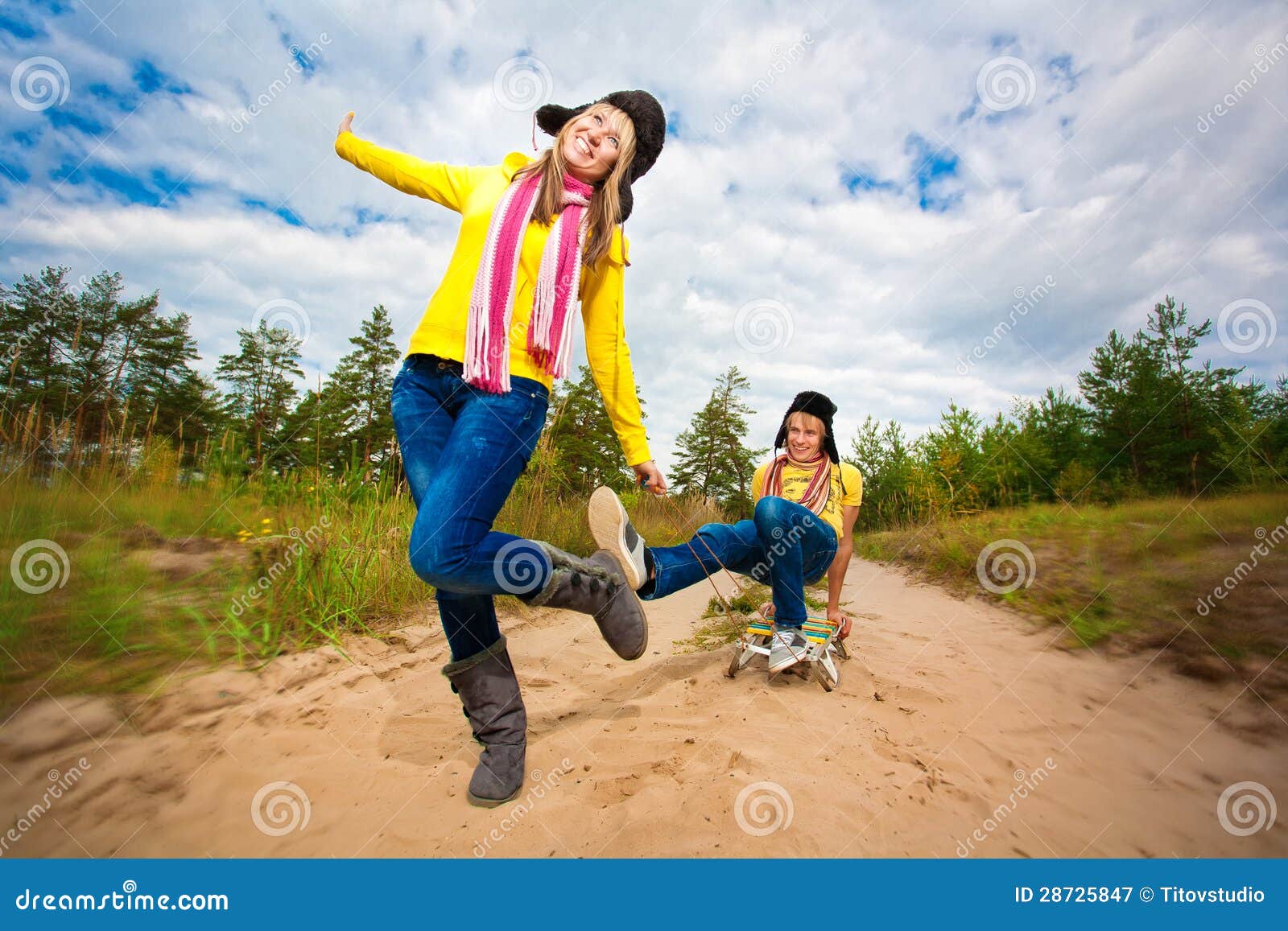 Funny Couple are Sledding at Summer Stock Image - Image of sand, couple ...