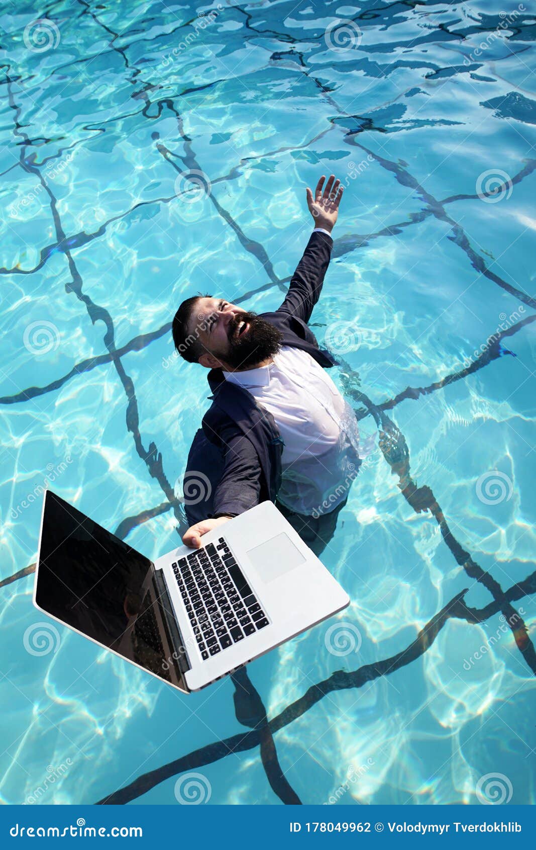 Funny and Crazy Man Freelancer in Suit Using a Computer in Swimming ...