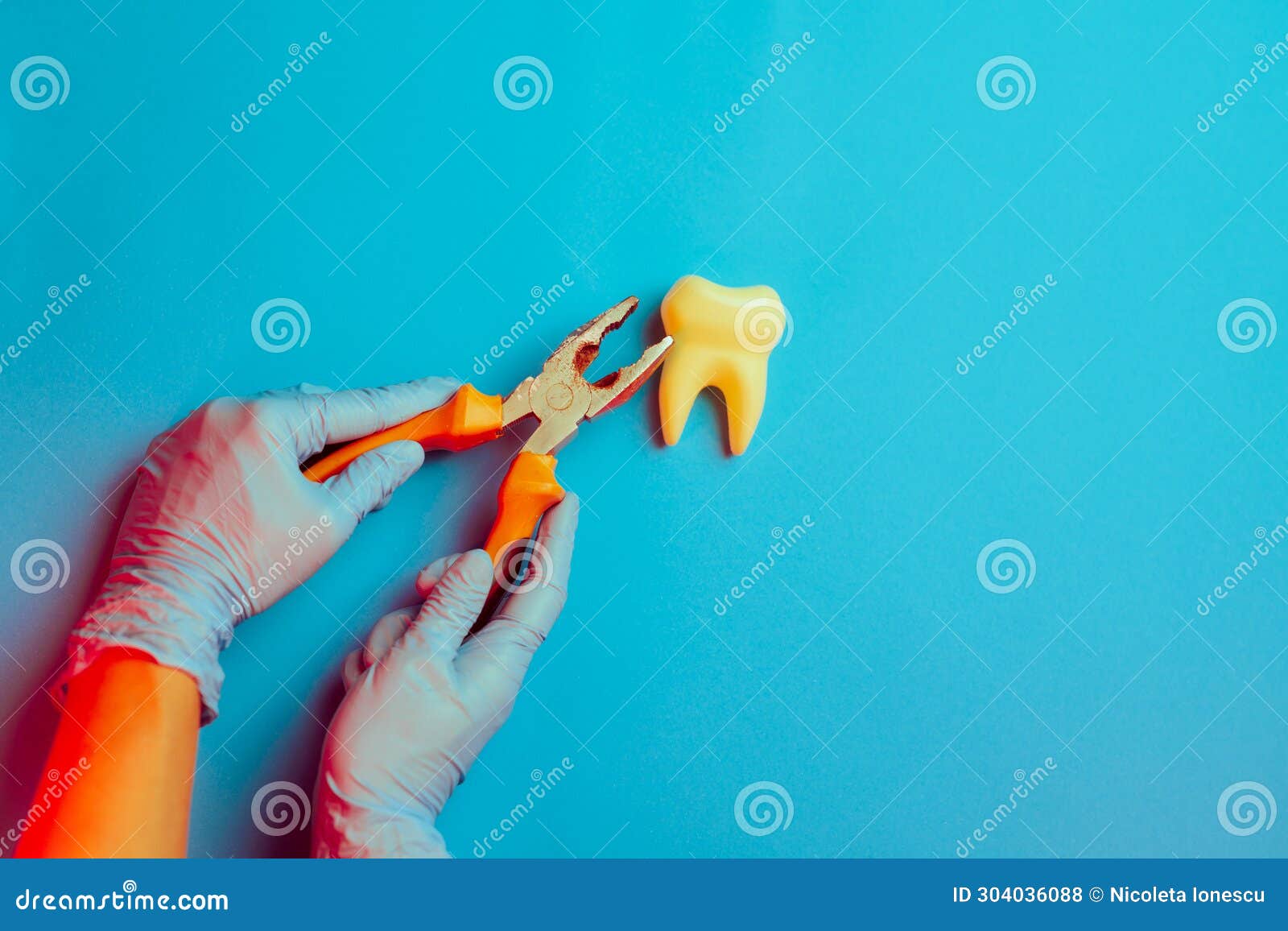 Funny Dentist Holding a Pair of Pliers Removing a Tooth Stock Photo ...