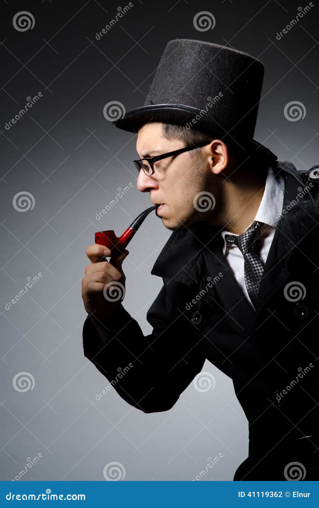 Funny detective with pipe stock photo. Image of profile - 41119362