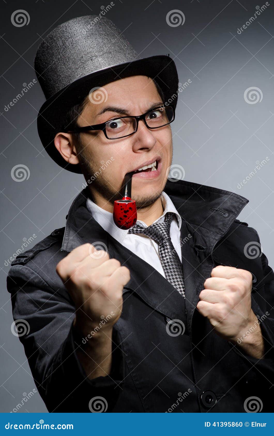 Funny detective with pipe stock photo. Image of coat - 41395860