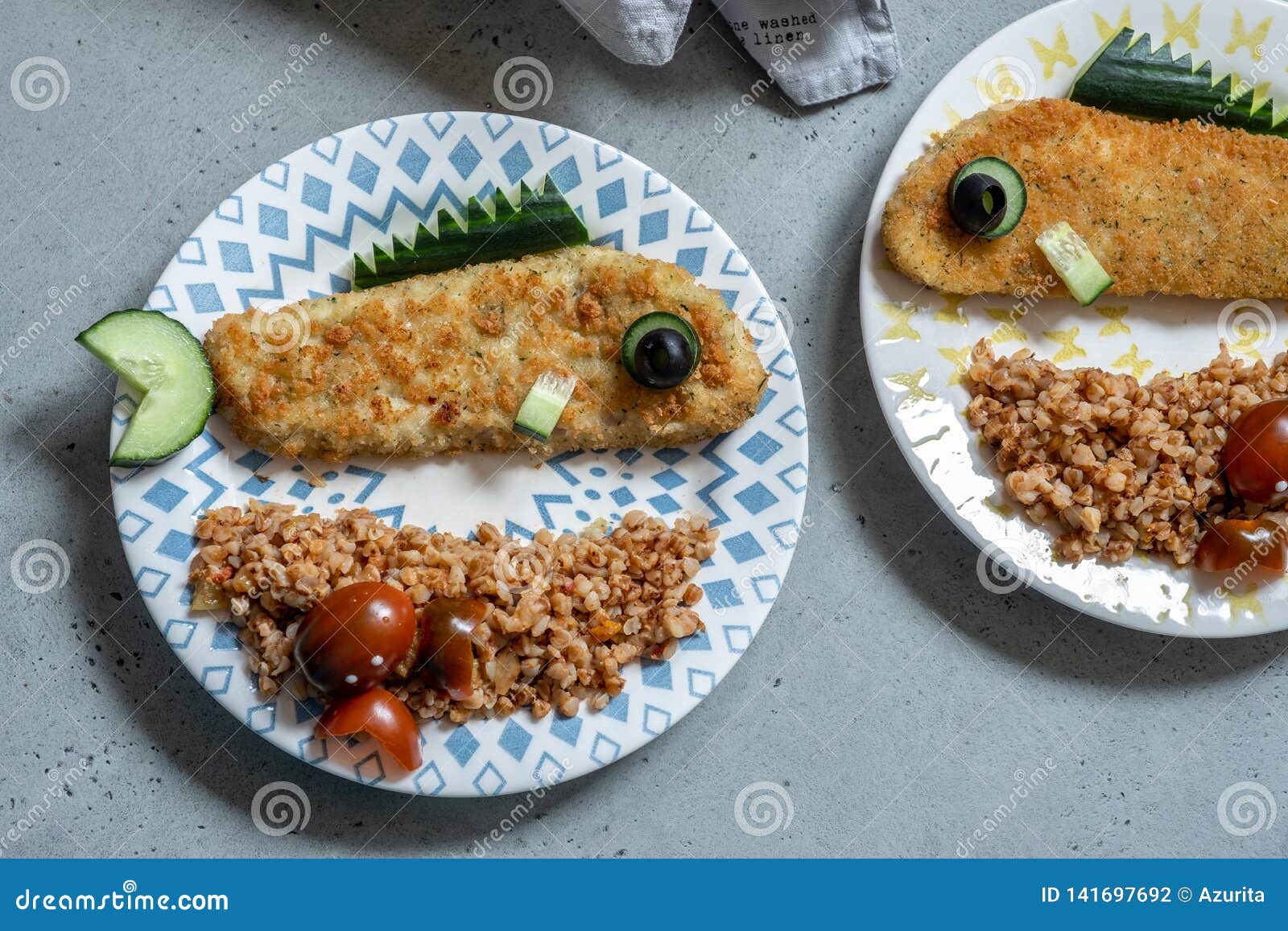 Funny Dinner with Fish and Buckwheat for Kids Stock Photo - Image of ...