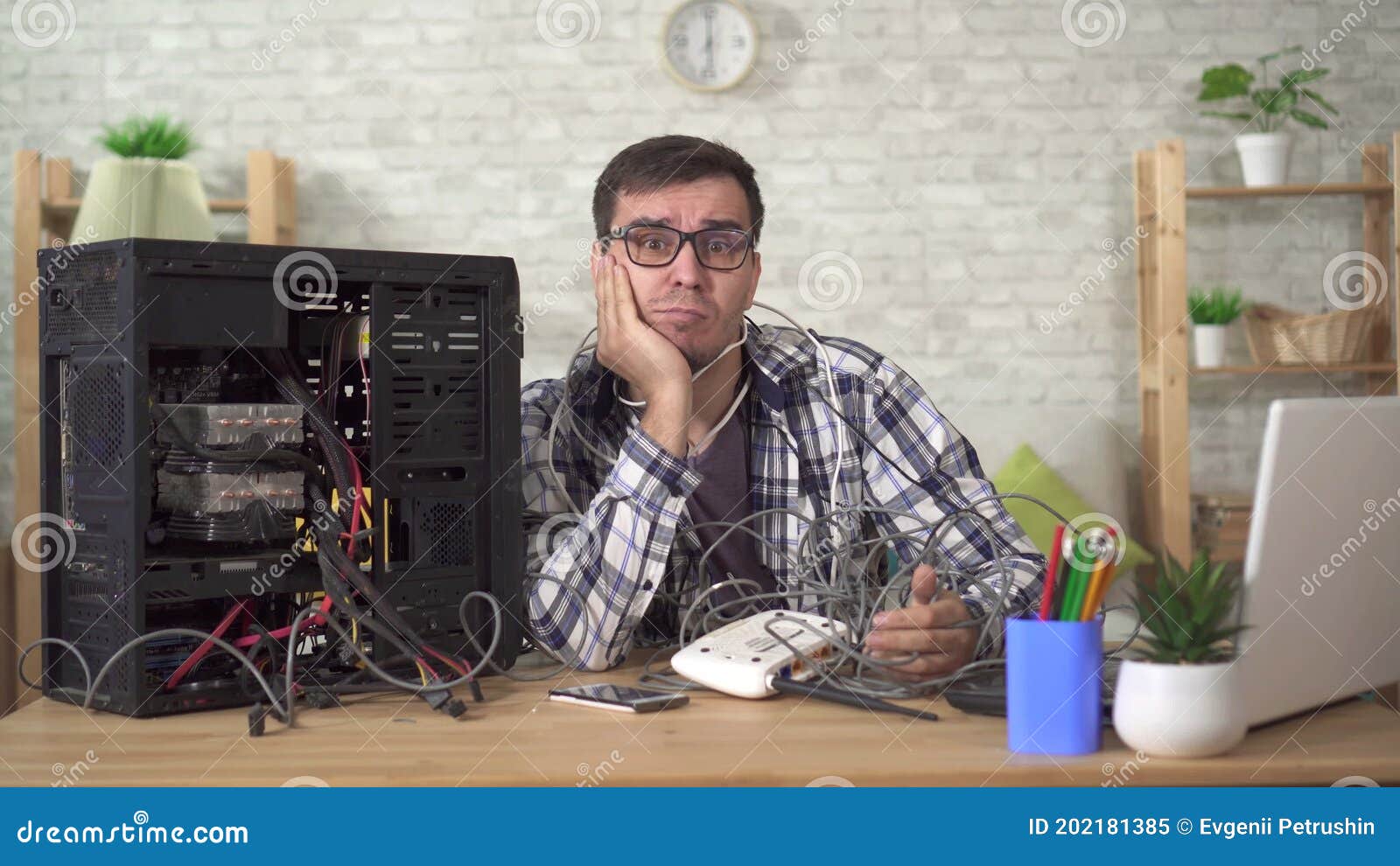 Funny Discouraged Man in Wires with a Router in His Hands Has Problems ...
