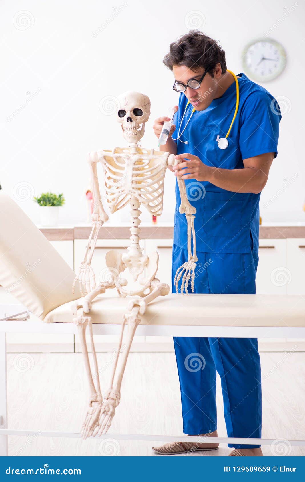 The Funny Doctor with Skeleton in Hospital Stock Image - Image of crazy ...