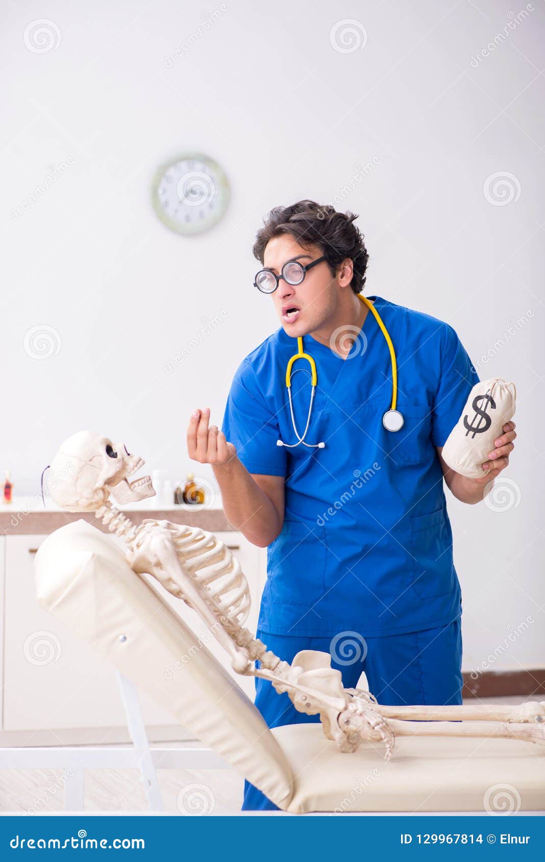 The Funny Doctor with Skeleton in Hospital Stock Photo - Image of ...