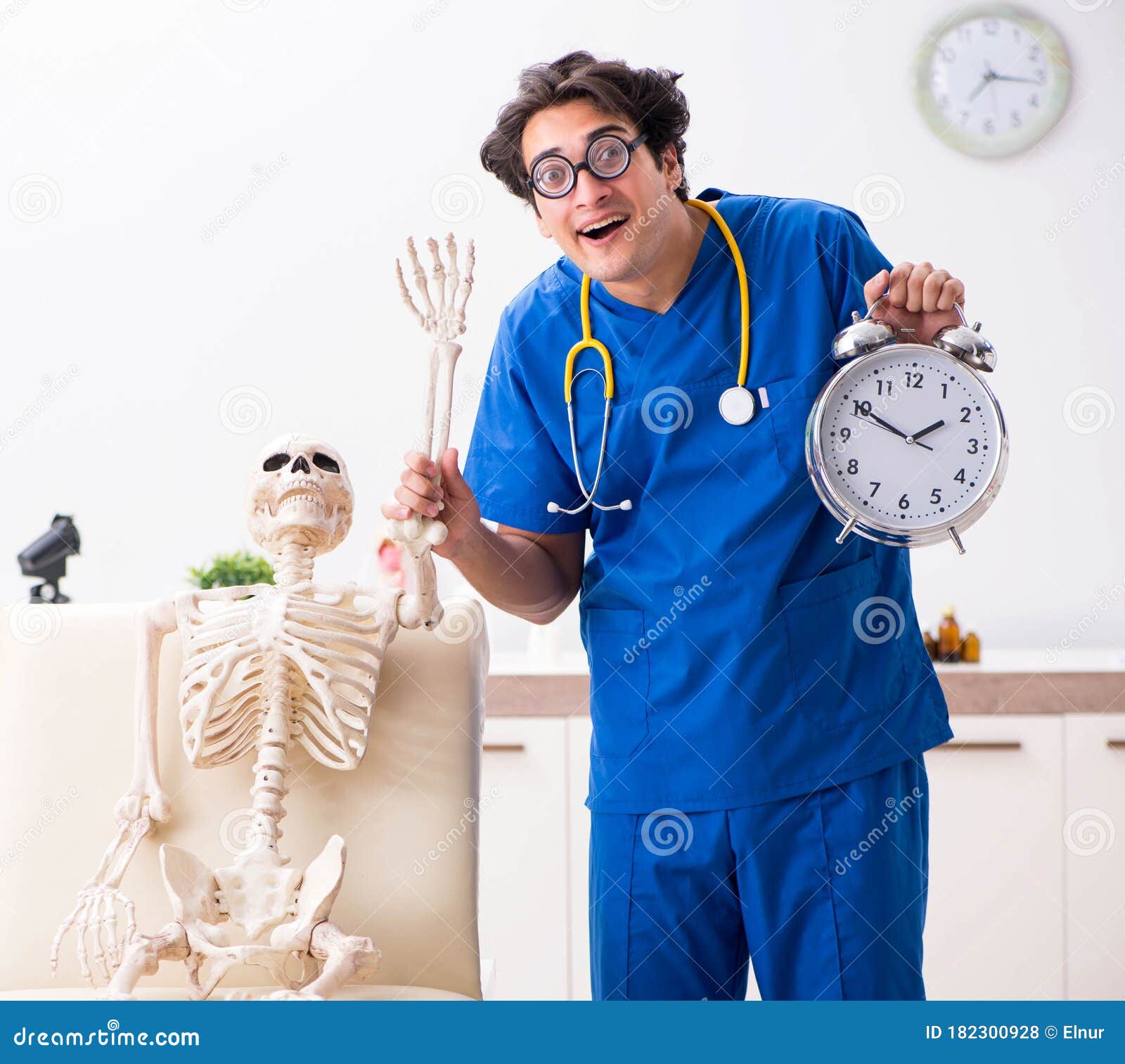 Funny Doctor with Skeleton in Hospital Stock Photo - Image of care ...