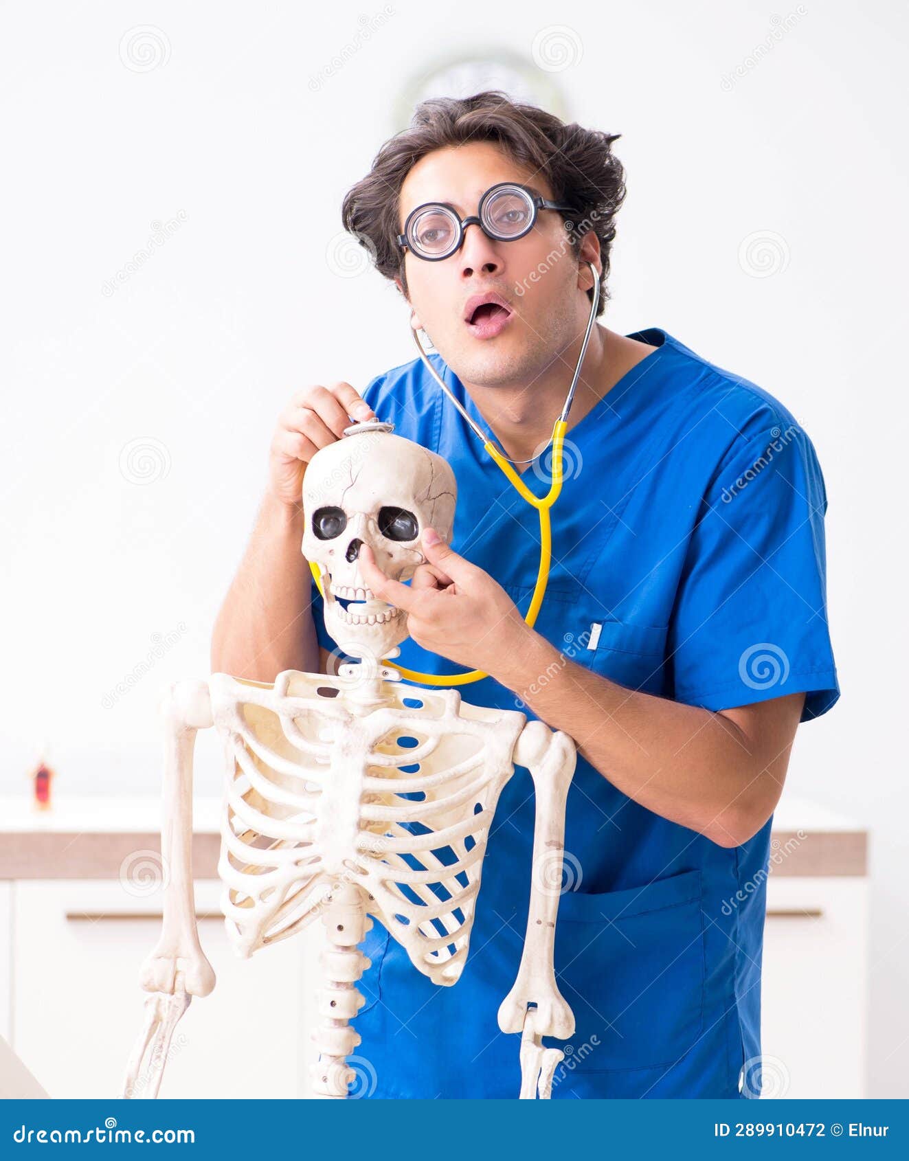 Funny Doctor with Skeleton in Hospital Stock Photo - Image of human ...