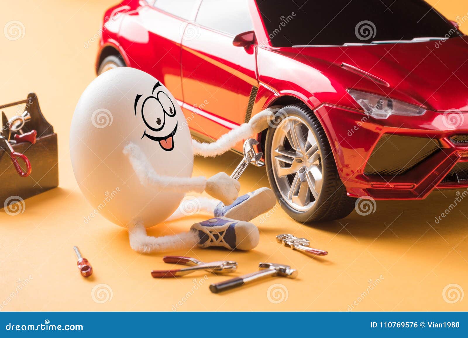 Funny Egg Car Mechanic Repair the Wheel Stock Photo - Image of garage ...