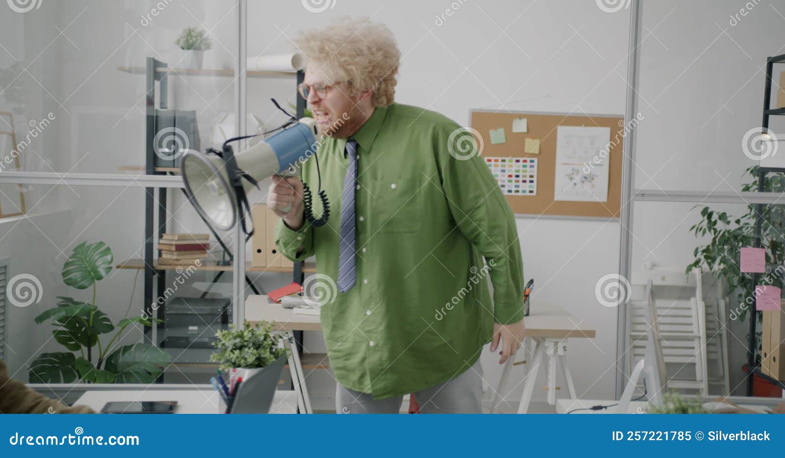 Funny Evil Guy Yelling at Subordinates Using Megaphone in Office Stock ...