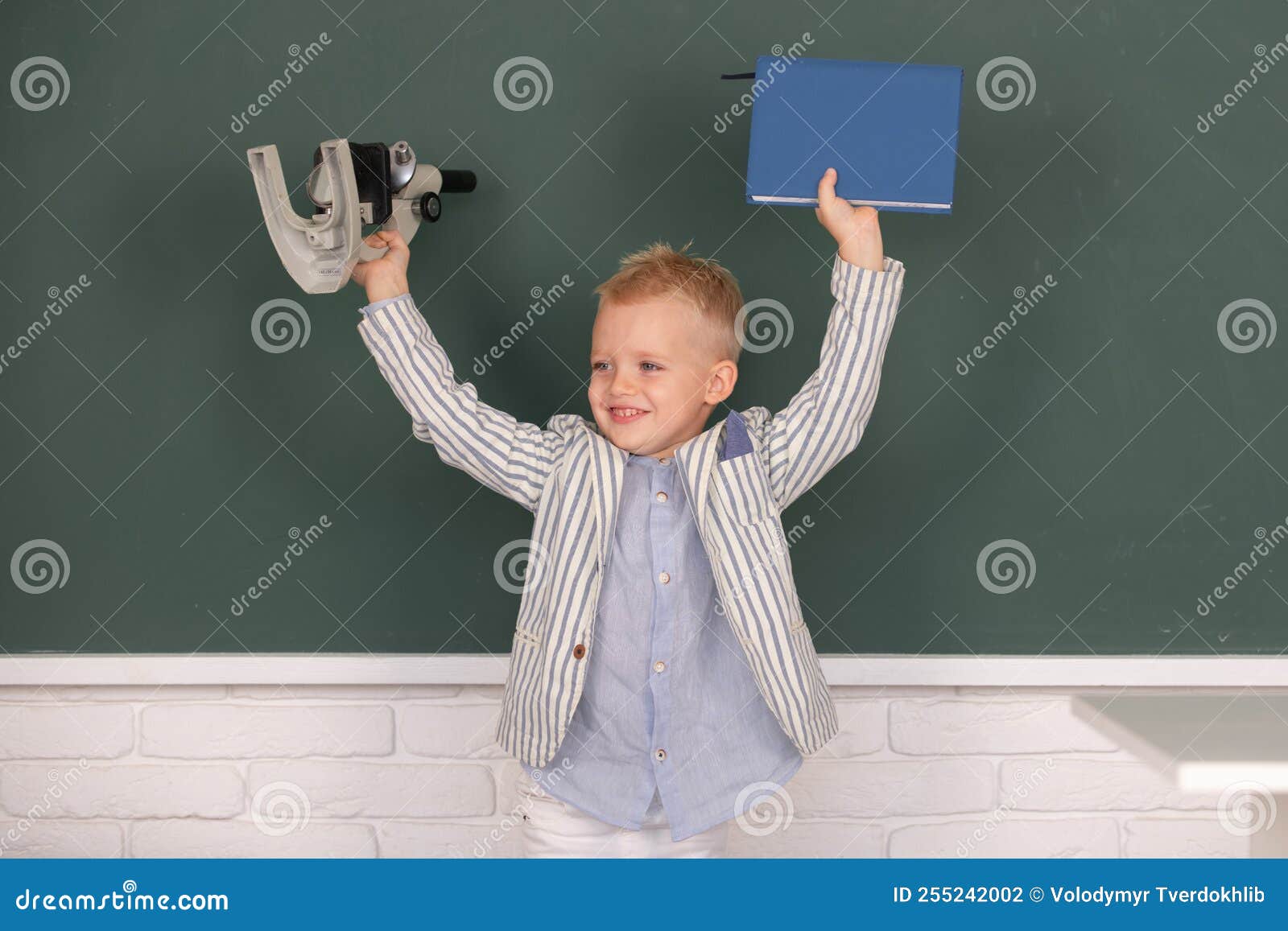 Funny Face of Little Student of Primary School Study in Classroom at ...