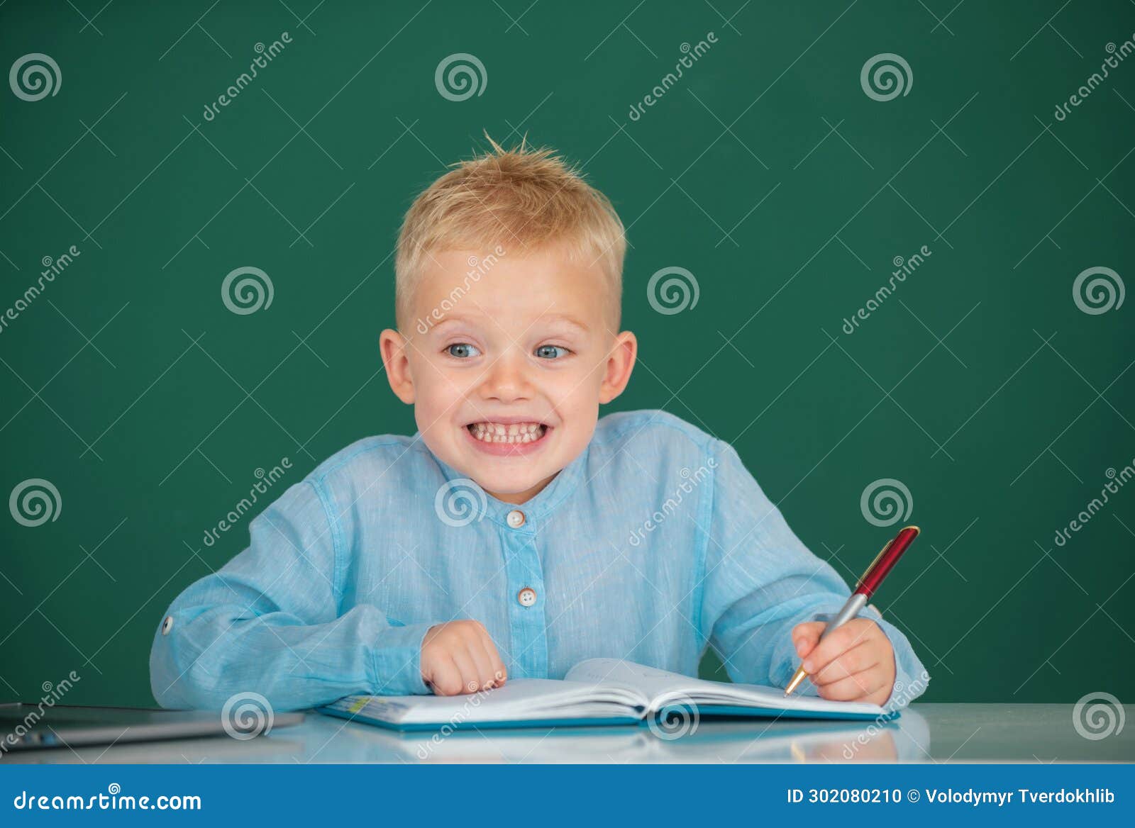 Funny Face of Little Student of Primary School Study in Classroom at ...